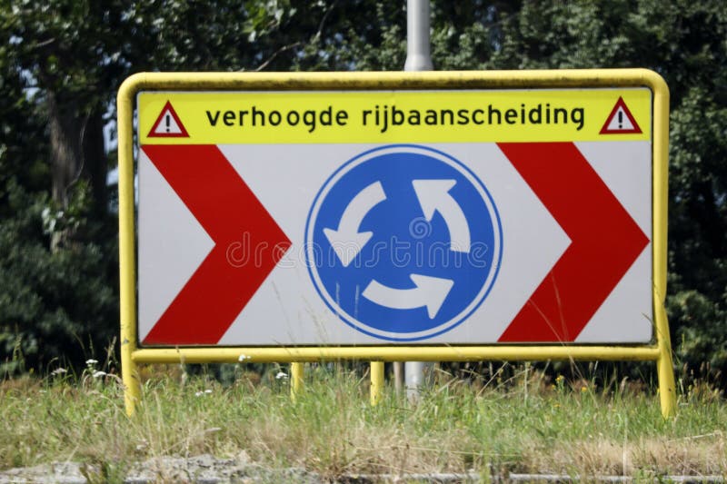 Sign for a Roundabout and Warning for Elevated Lane Separation ...