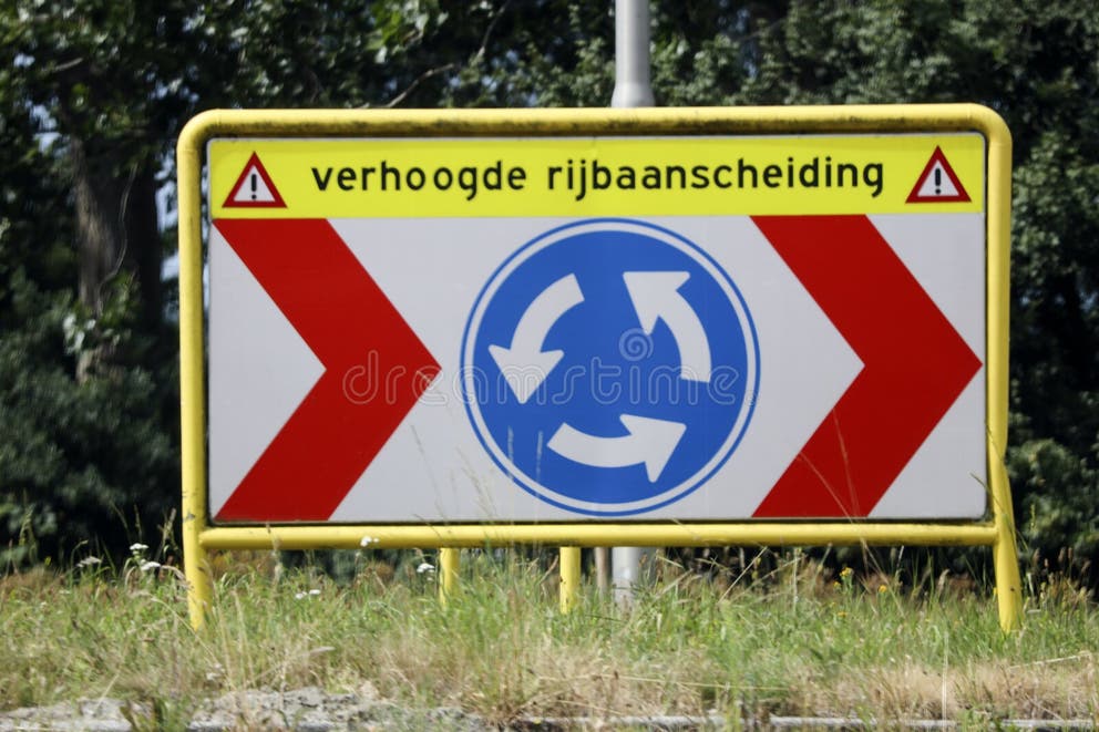 Sign for a Roundabout and Warning for Elevated Lane Separation ...