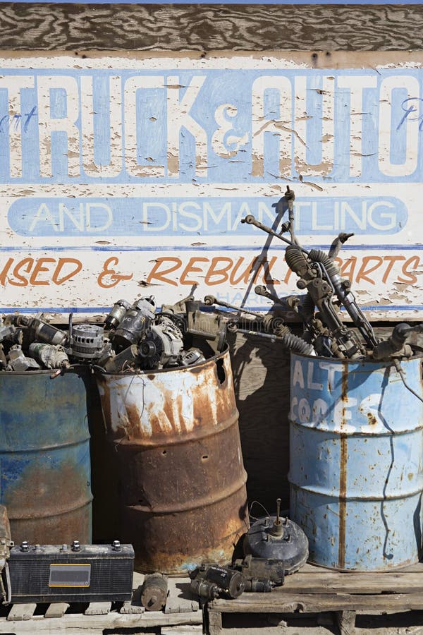 Sign and Rusty Barrels in Junkyard Stock Image - Image of wreck ...
