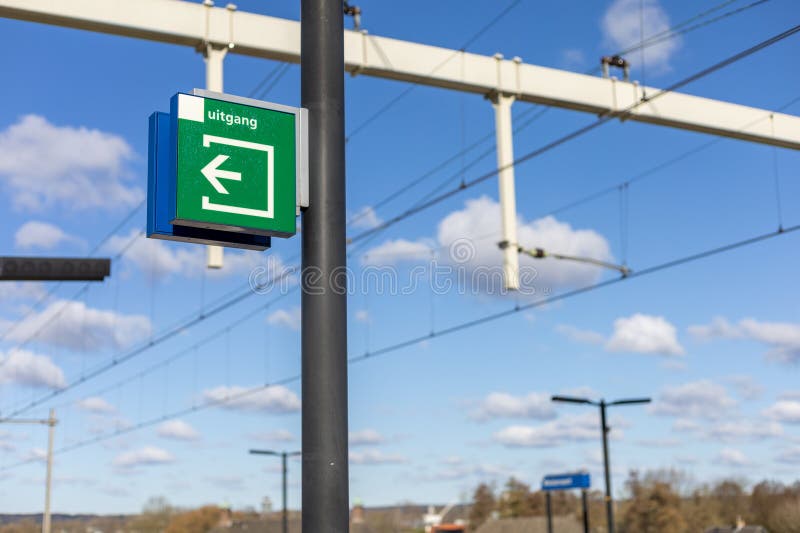 Sign Saying Exit in Dutch at a Train Station Stock Photo - Image of ...