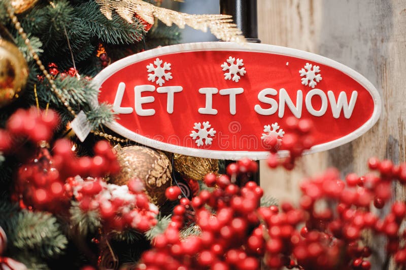 Sign saying let it snow stock image. Image of carrot - 63002323