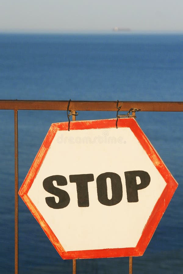 Sign at the sea shore stock image. Image of information - 23329665