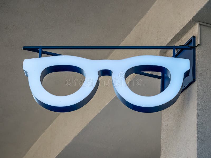 Sign in the Shape of an Eyeglasses Frame on a Wall Stock Photo - Image ...