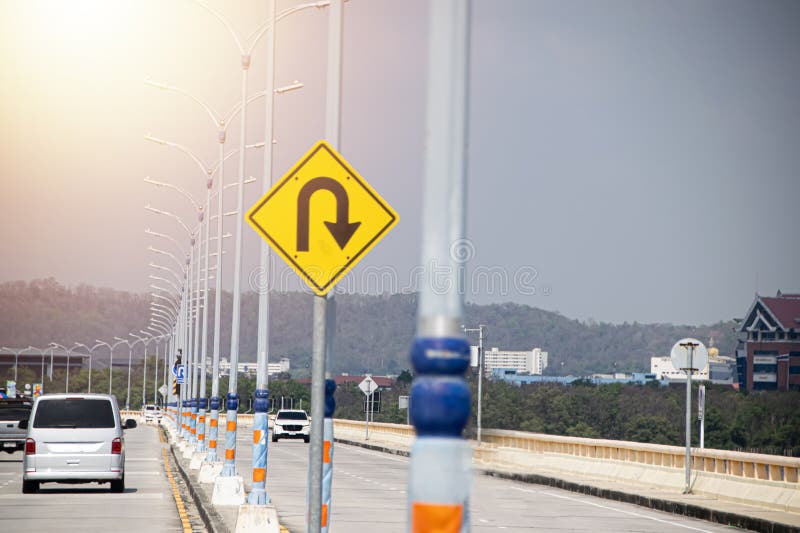 Sign Showing the U-turn Lane in Front Stock Image - Image of black ...