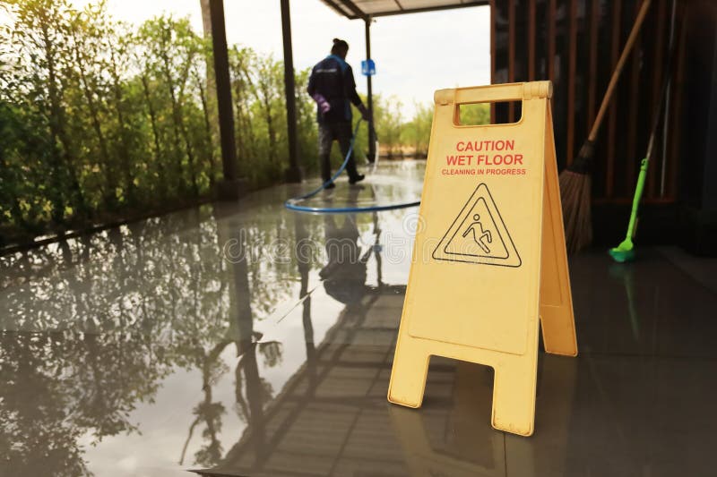 Sign Showing Warning of Caution Wet Floor. Stock Photo - Image of ...
