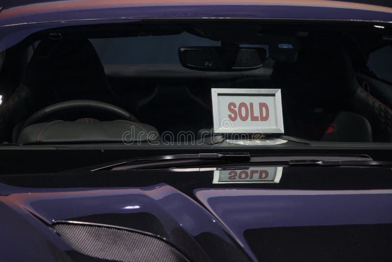 The Sign Shows that this Car Has Been Sold. by Placing in Front of the ...
