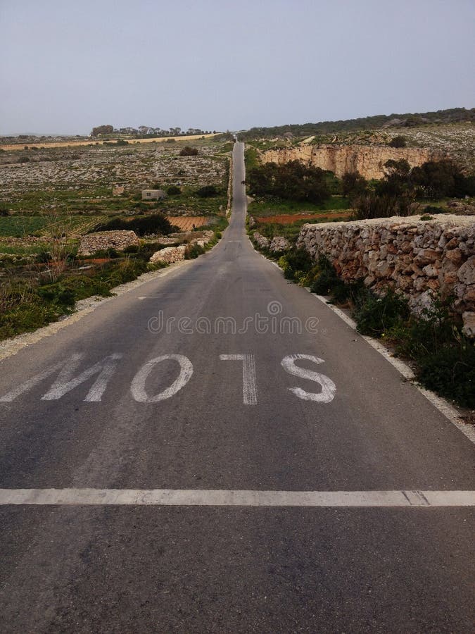Sign Slow on a Long Rural Road Stock Image - Image of hiking ...