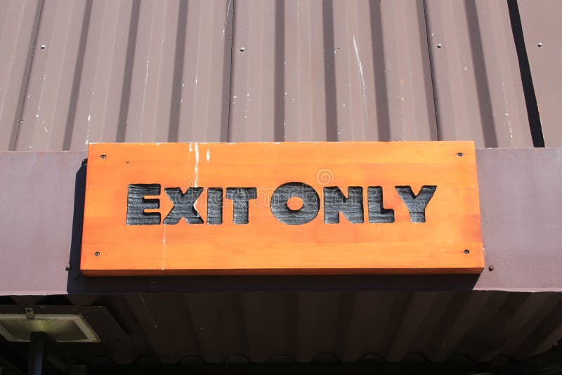 Sign stating EXIT only stock photo. Image of letters - 57090840