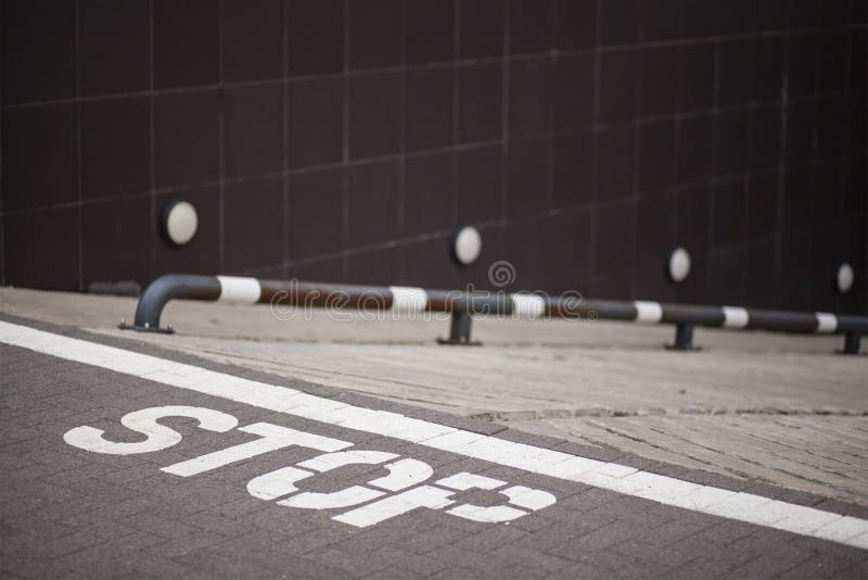 Sign stop on the ground stock photo. Image of modern - 147601800