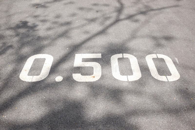 0.500 Sign and Symbol on Concrete Floor in the Park is Number and Phase ...