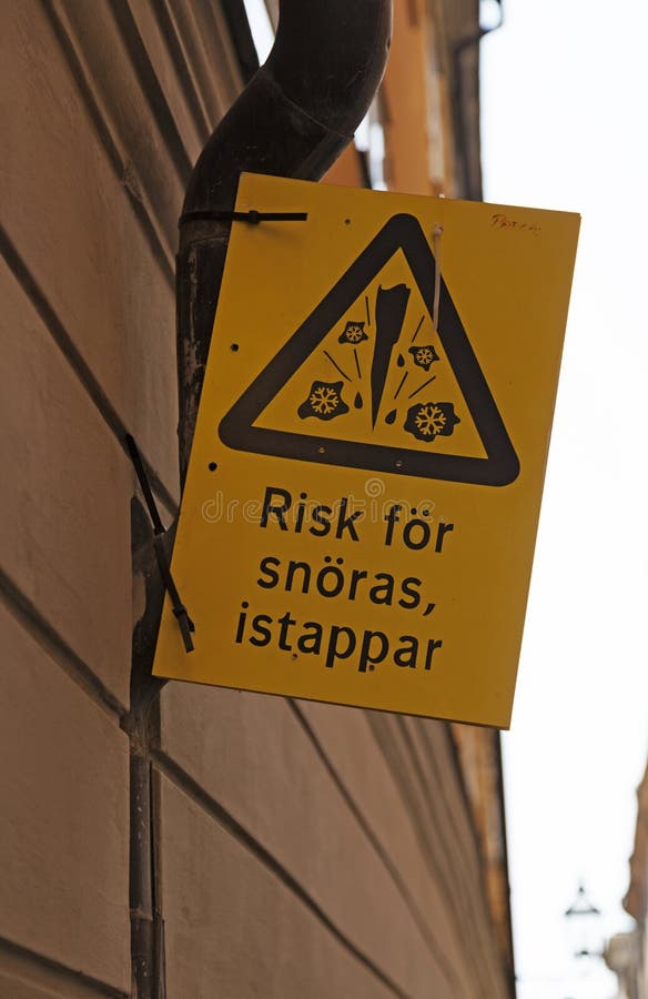 A Sign with the Text Warning of Sharp Icicles Stock Image - Image of ...