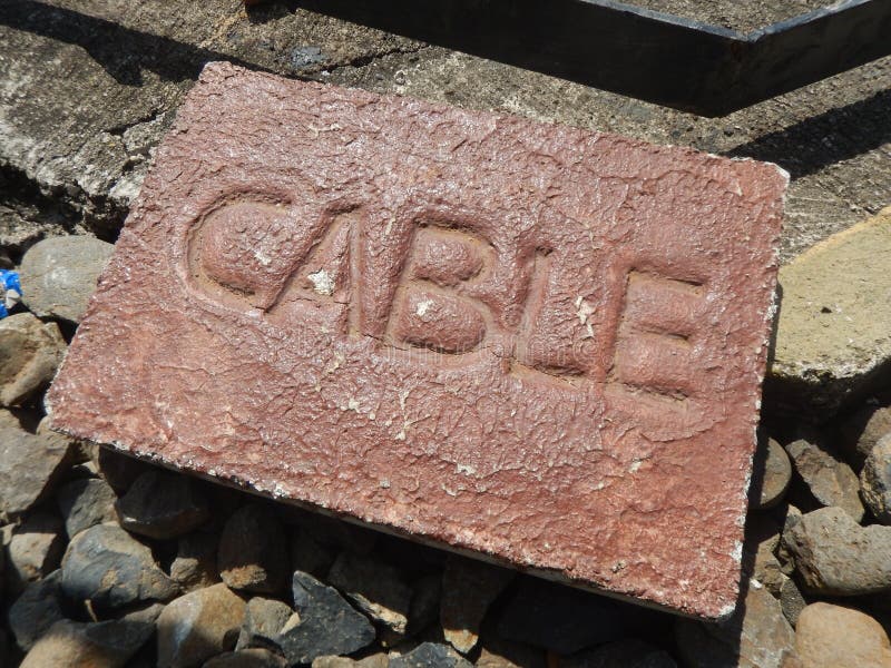 A Sign There is a Cable Installation in the Ground Stock Photo - Image ...