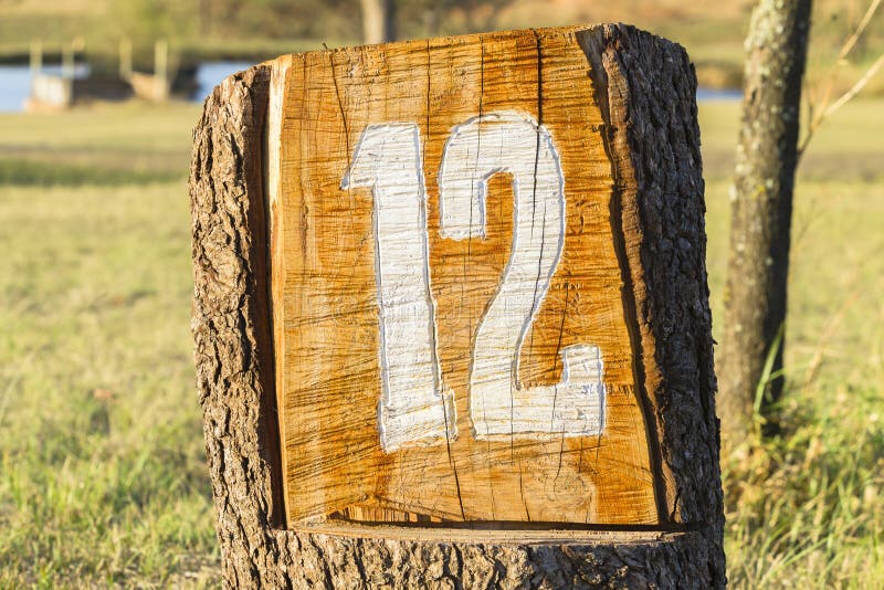 Sign Twelve 12 Golf Hole stock photo. Image of marker - 59611284