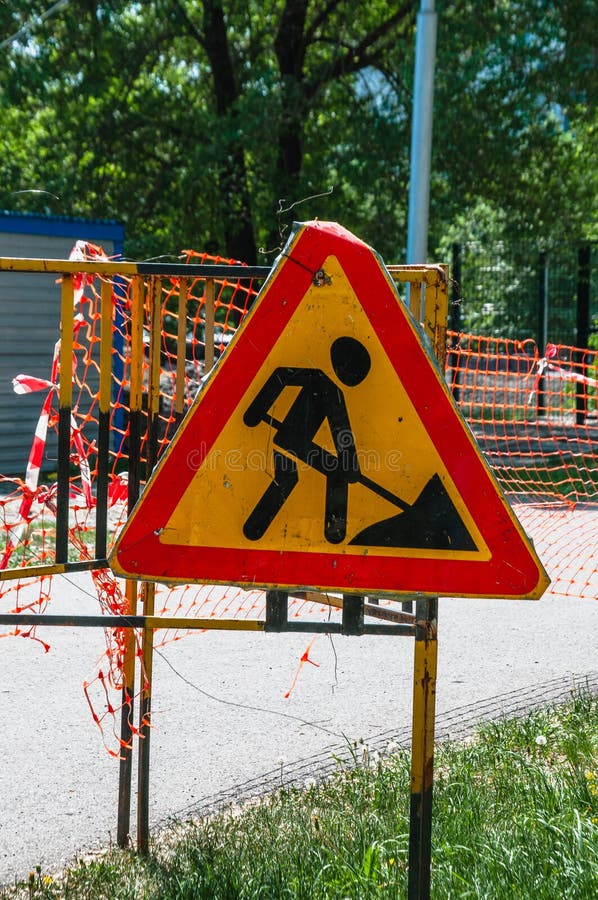 A Sign Under Construction on a Closed Road. a Warning Sign Under ...