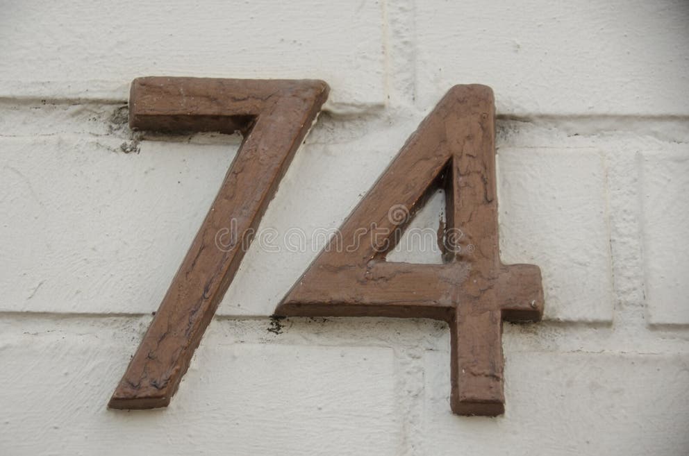 A Wall with the Number Seventy-four Stock Photo - Image of isolated ...