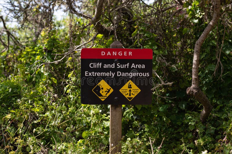Dangerous Cliff Sign stock photo. Image of coast, outdoor - 246476212