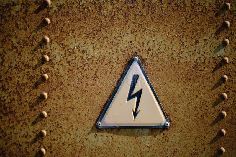 Sign with Warning High Voltage an Old Rusty Metal Surface Stock Image ...