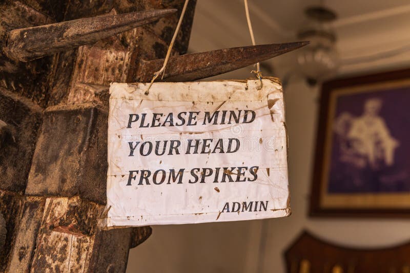 Sign Warning Visitors of Sharp Spikes Editorial Photo - Image of ...