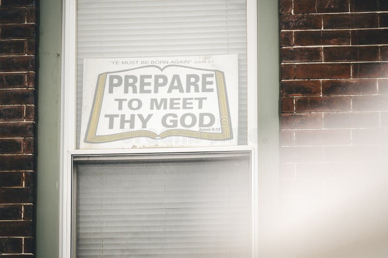 A Sign Reading Prepare To Meet Thy God in a Window Stock Image - Image ...