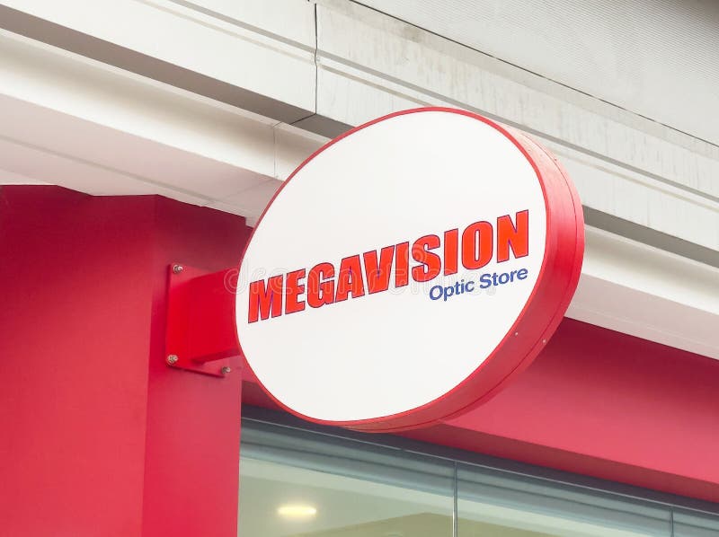 Signage of Megavision Optic Store on Red Building Exterior Editorial ...