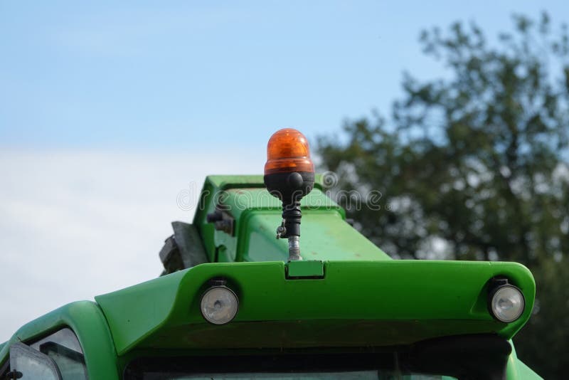 Signal Orange Dome LED Light at Tractor Stock Photo - Image of light ...