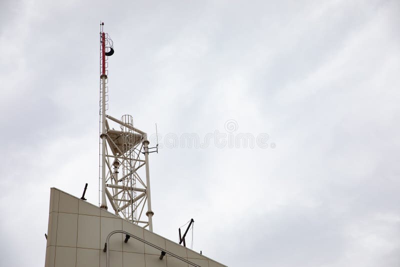 Signal Tower on Top of Building Stock Photo - Image of equipment, neon ...