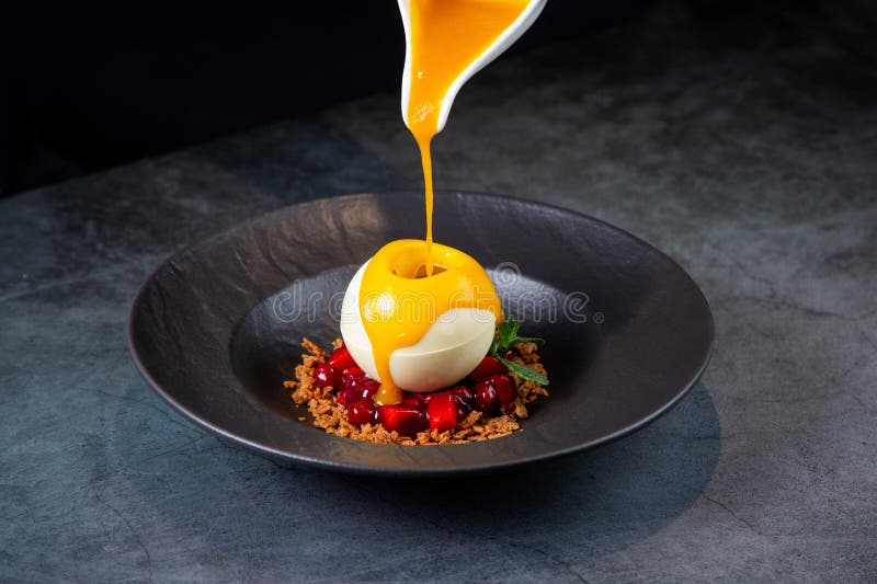 Signature Dessert Laureate with Fruit Syrup Side View Stock Photo ...