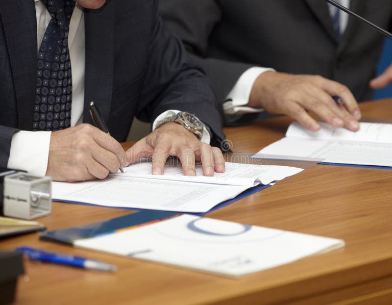Signing a contract stock image. Image of businessman, agreement - 4718189
