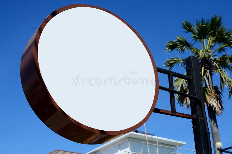 Signboard on blue sky stock image. Image of metal, sign - 65500165
