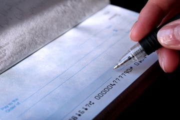 Signing a blank check stock photo. Image of dollars, fees - 15697654