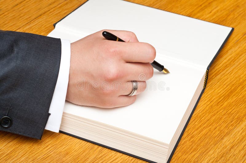 Signing a book stock photo. Image of diary, education - 15079188