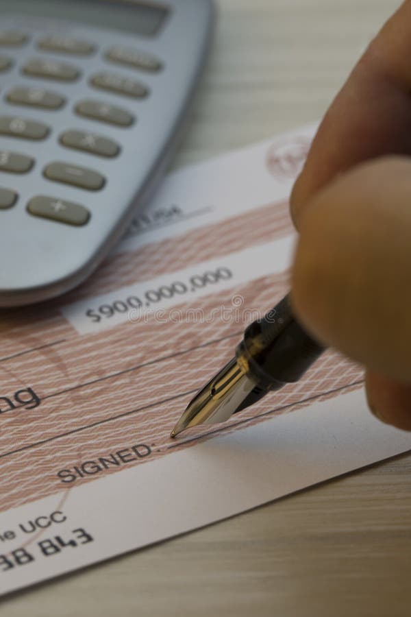 Signing a Check stock photo. Image of buying, finance - 52464360