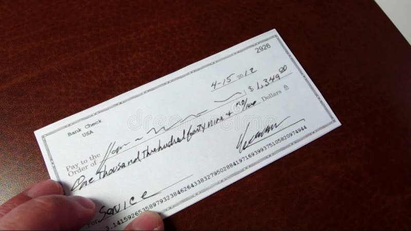 Signing a Check and Stamping it Reject Stock Video - Video of check ...