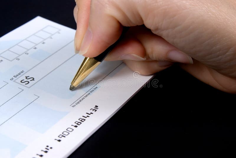 Signing the Check stock image. Image of business, payment - 985053