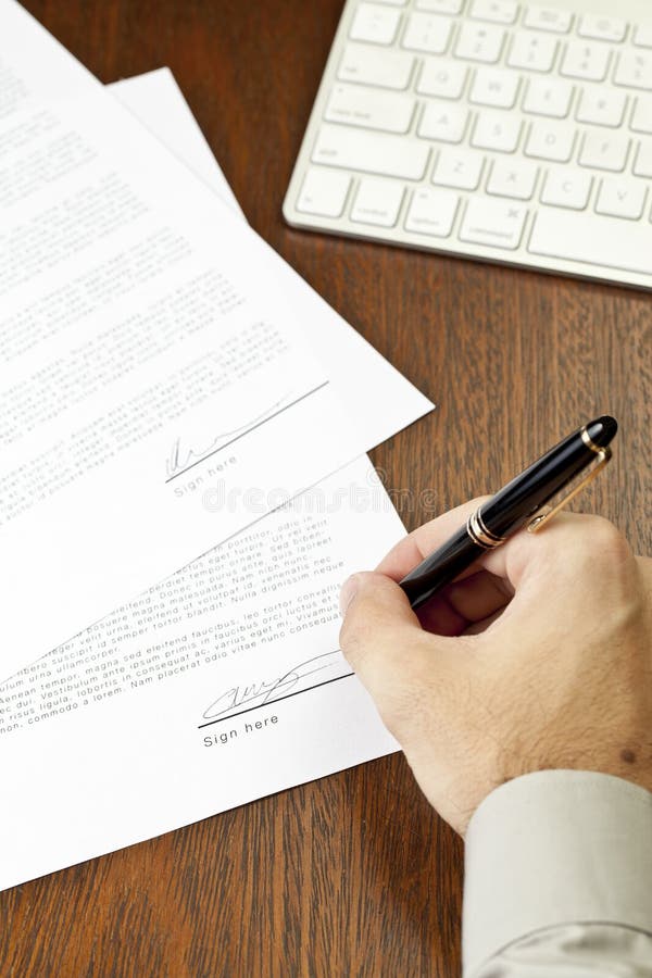 Signing a Contract stock image. Image of writing, signing - 23095223