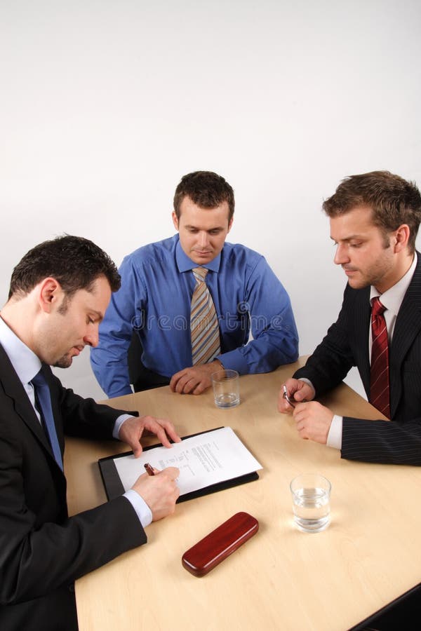 Signing a contract stock image. Image of businessmen, corporation - 2760119