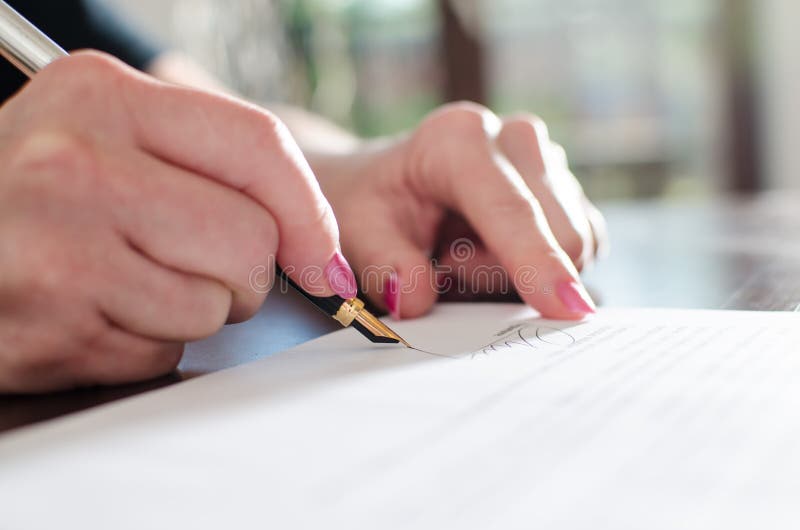 Signing of a contract stock image. Image of signature - 49549641