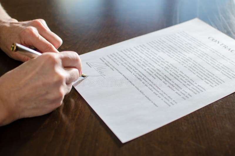 Signing of a contract stock photo. Image of legal, signature - 49549992