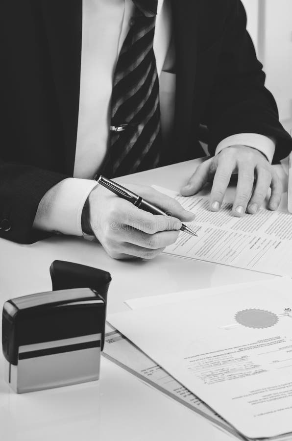 Signing Contract. Lawyer or Notar on His Workplace Stock Photo - Image ...