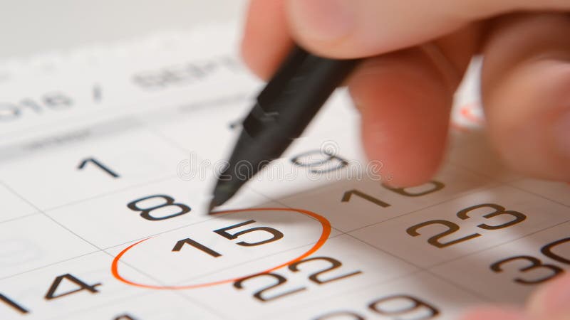 Signing a Day on a Calendar by Pen Stock Photo - Image of salary, hand ...