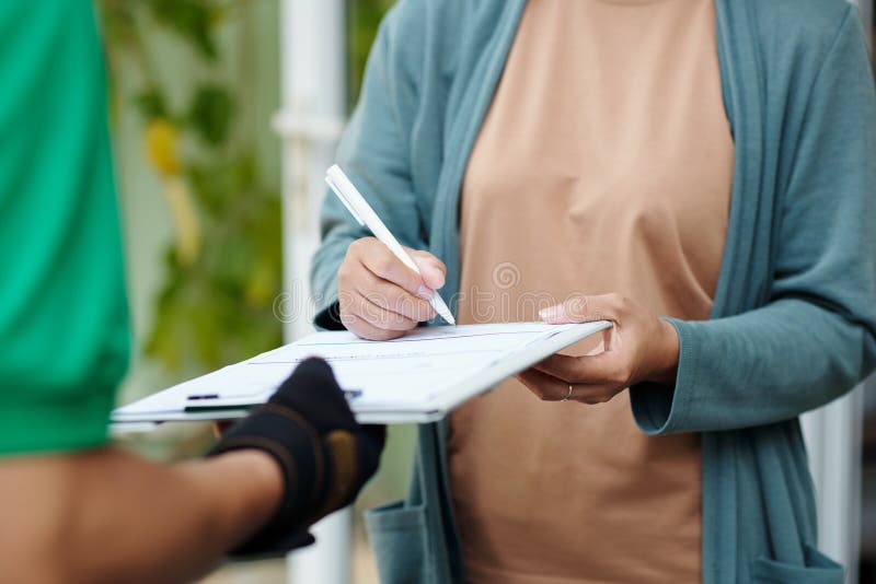 Signing Delivery Documents stock photo. Image of form - 269318196