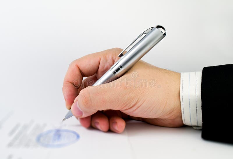 Signing a document stock photo. Image of form, contract - 17880922