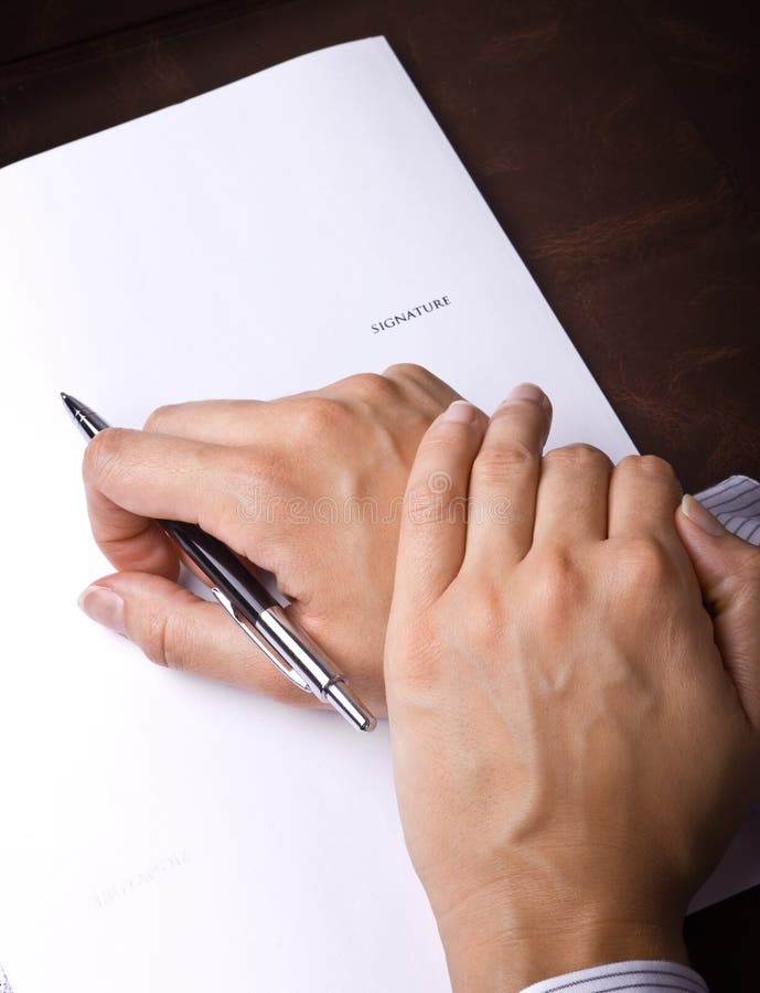 Signing a document stock photo. Image of closeup, desk - 27307902