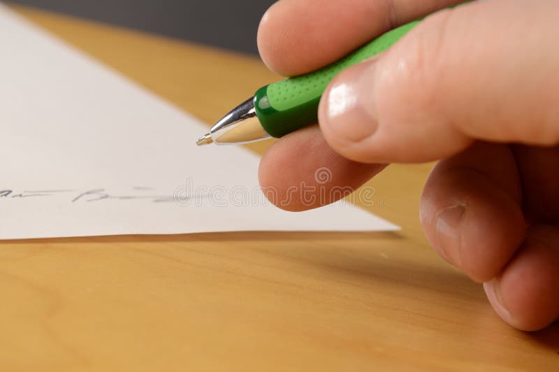 Signing the Document stock photo. Image of finger, paper - 203054880