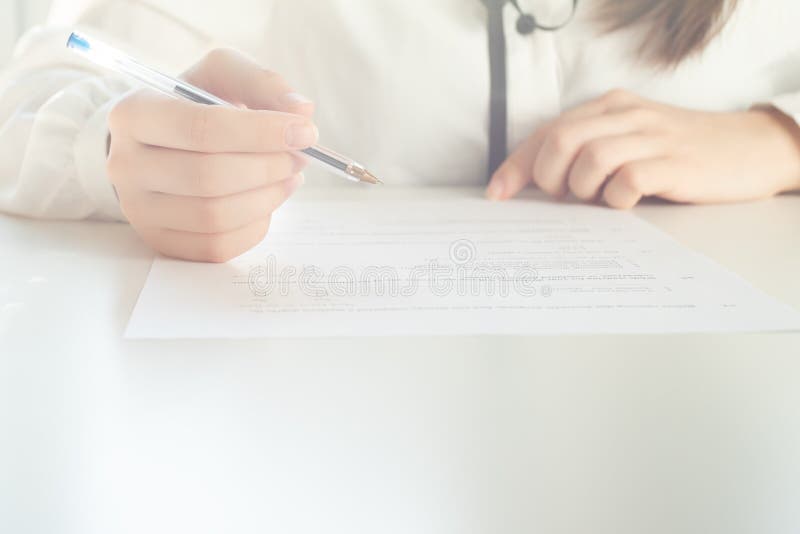 Signing of Documents for Permits, Consent. Hands Hold a Pen Over Paper ...