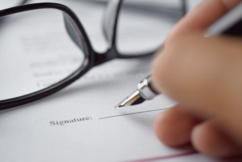 Signing a form stock photo. Image of form, caucasian - 119674318