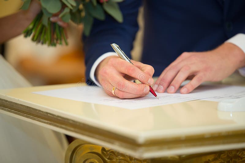 The Signing of the Marriage Contract. Wedding Day. Stock Photo - Image ...