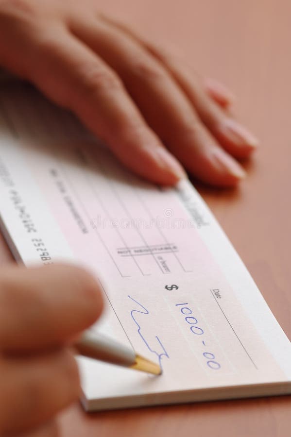 Signing a money cheque stock photo. Image of finger, deposit - 2126960
