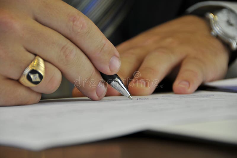Signing of official papers stock image. Image of human - 10652329