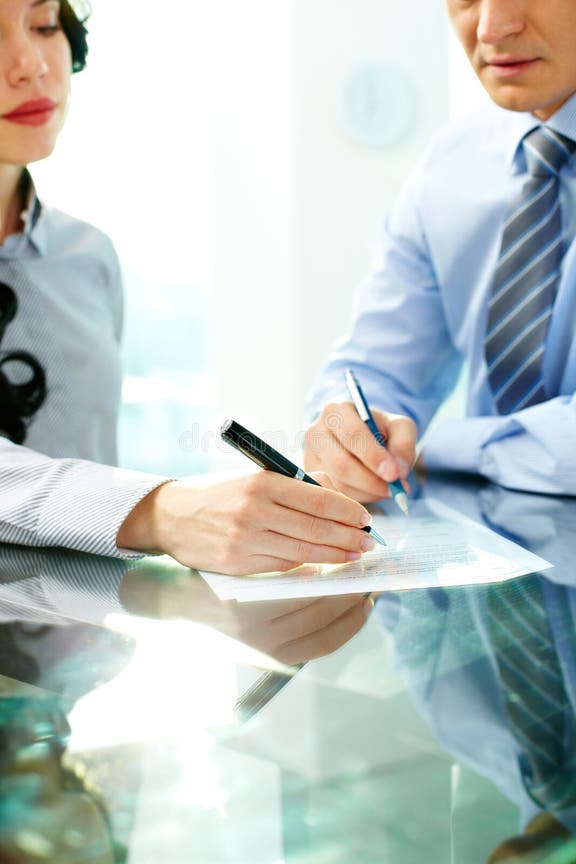 Signing a paper stock photo. Image of arms, paper, colleague - 26279054